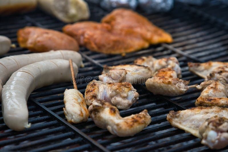 Meat Assortment on the Barbecue Grill Stock Photo - Image of sausage ...