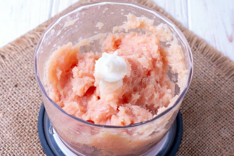 Meat in a bowl of blender stock image. Image of equipment - 153359605