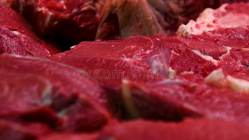 Meat at a butcher shop stock footage. Video of butchery - 248425492