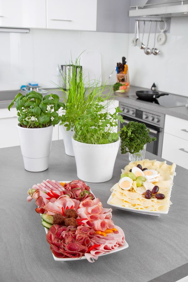 Meat and Cheese Assortment on Table in the Kitchen Stock Image - Image ...
