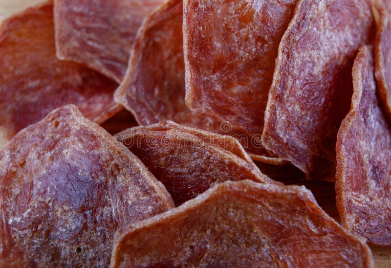 Meat Chips. a Backdrop of Pieces of Meat Stock Photo - Image of snack ...