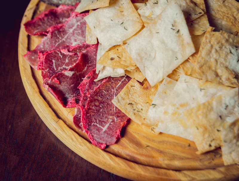 Meat and chips stock image. Image of party, glass, snack - 64976005