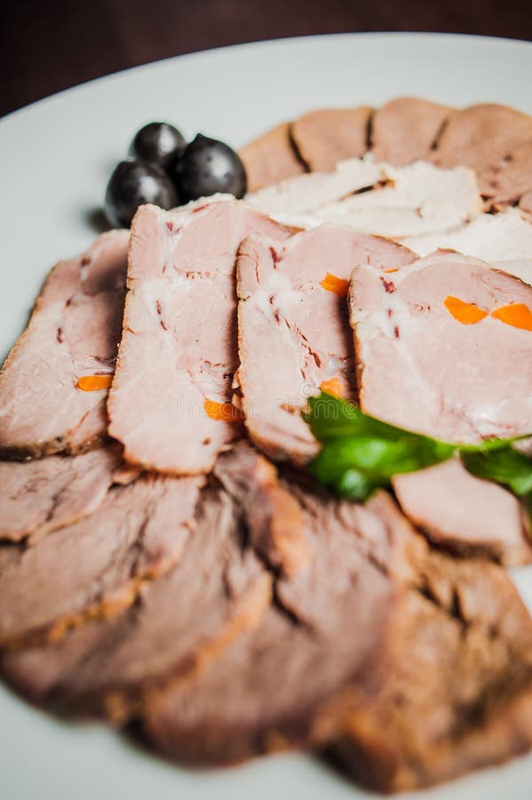 Meat cold cuts with olives stock image. Image of cafe - 177696131