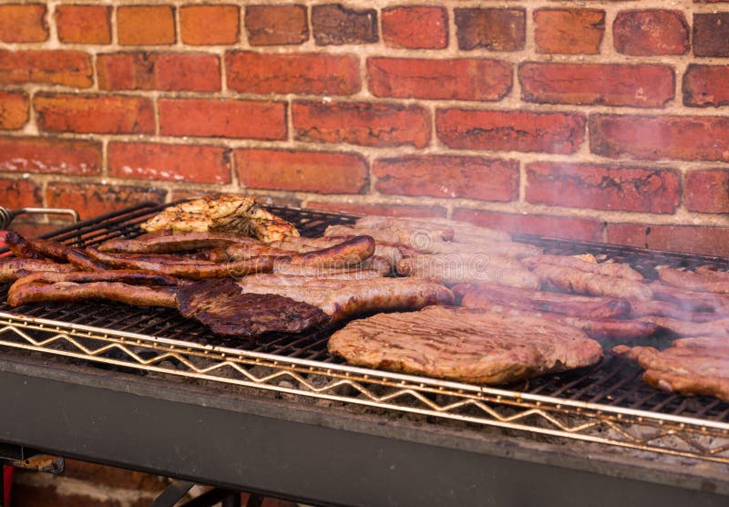 Meat Cooking on an Outdoor Grill Stock Photo - Image of meats, cooking ...