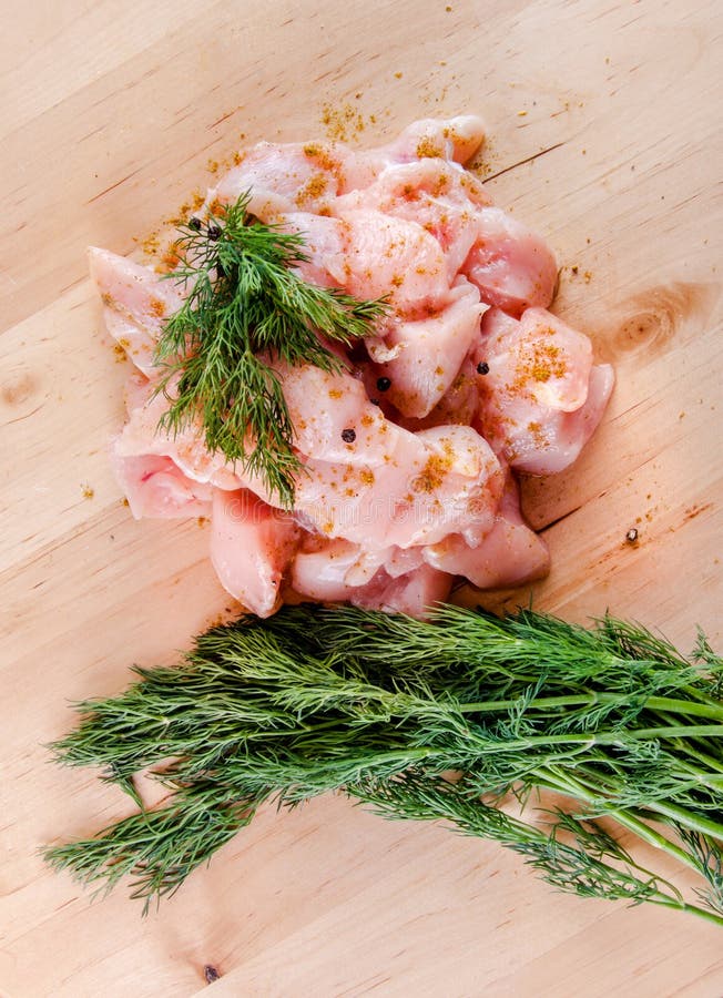 Meat Cut into Chunks and Dill Stock Image - Image of seasoning, board ...