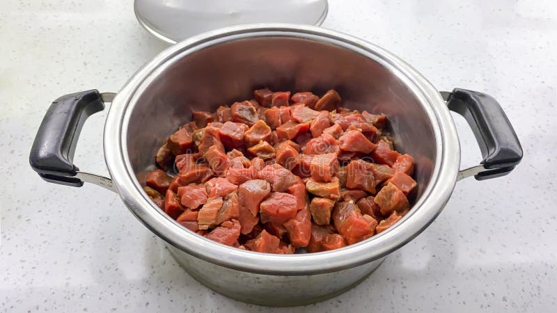 Meat Cut into Morsel Sized Pieces in the Pot Stock Photo - Image of ...