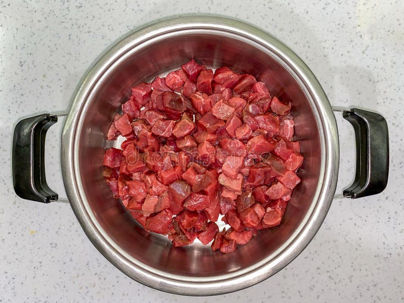 Meat Cut into Morsel Sized Pieces in the Pot Stock Photo - Image of ...