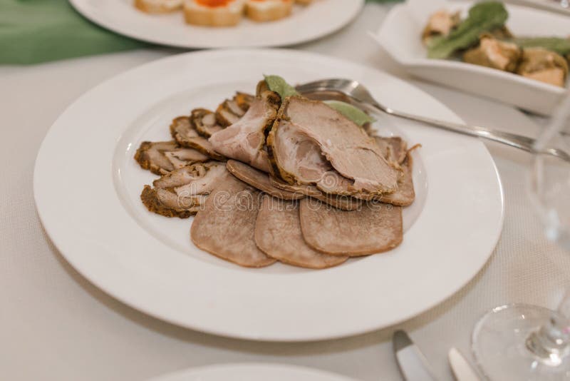 Meat Cut on a Plate on a Festive Table in a Restaurant Stock Photo ...