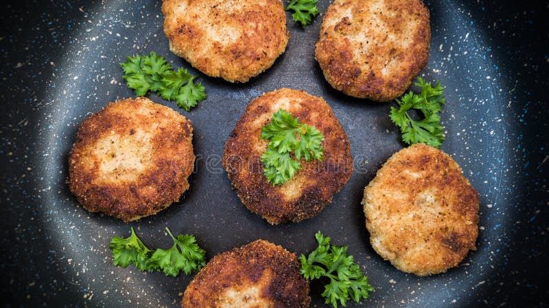 Meat cutlets in a pan stock photo. Image of dinner, cutlet - 139826696