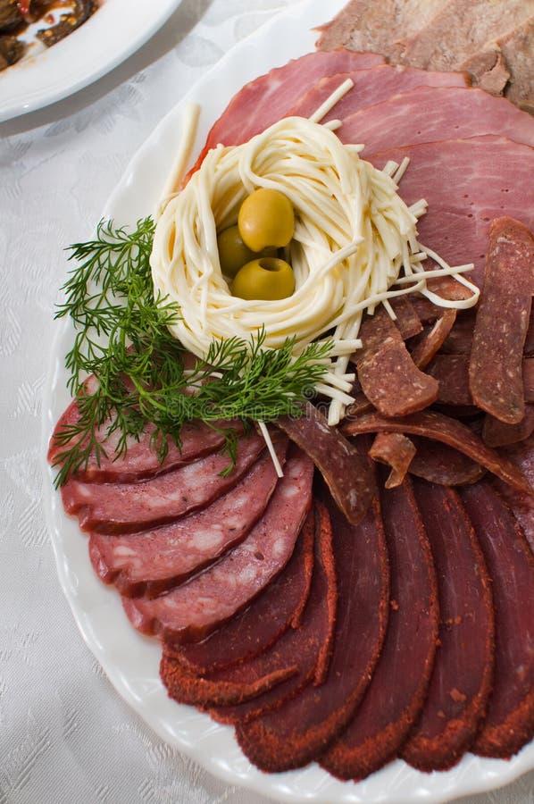 Meat cutting. stock photo. Image of nest, olives, cheese - 7958112