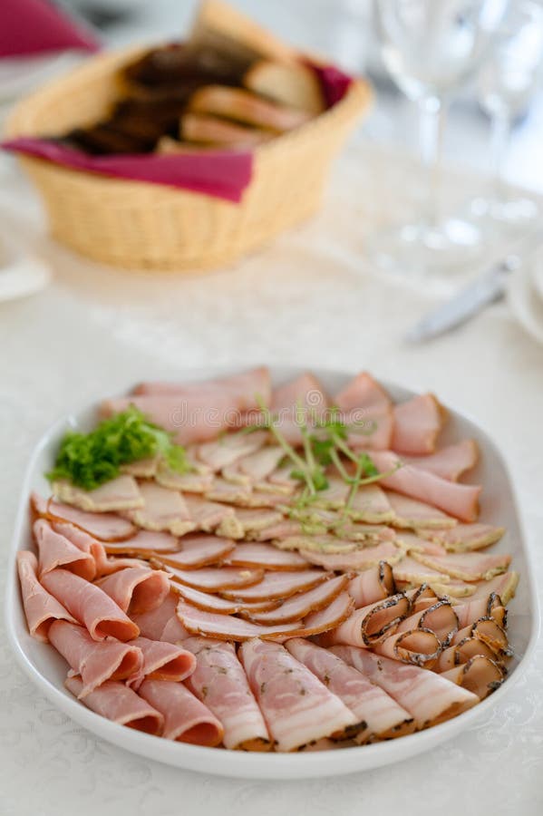 Meat Cutting and Its Presentation on the Festive Table Stock Image ...