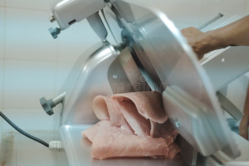 Meat Cutting Slicing Machine in Food Processing Factory Stock Photo ...