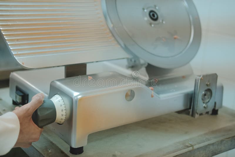 Meat Cutting Slicing Machine in Food Processing Factory Stock Photo ...