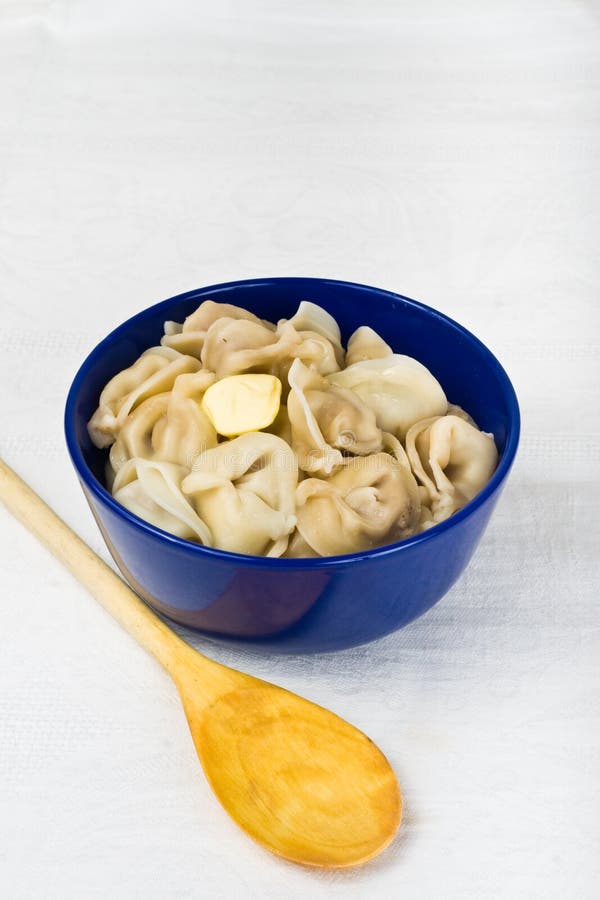 Dumplings In A Plate With A Spoon Stock Photo - Image of fillings ...
