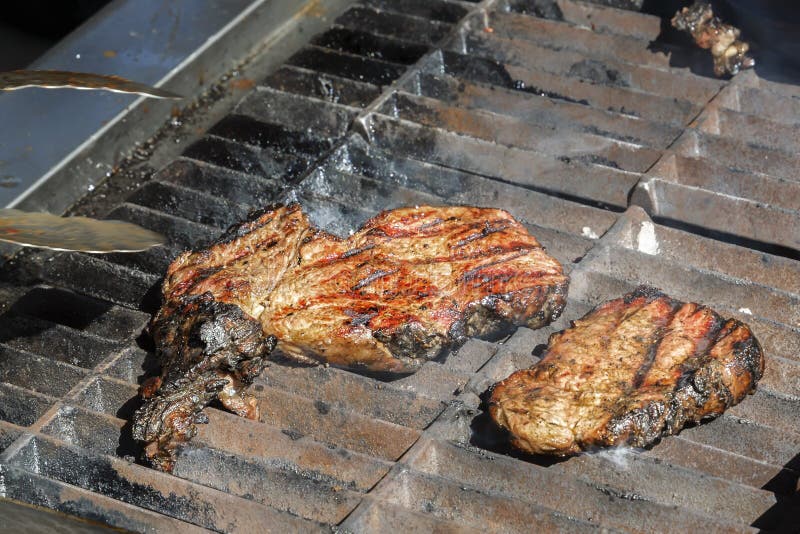 Meat Fillet of a Barbecue is Cooked with Smoke Stock Image - Image of ...