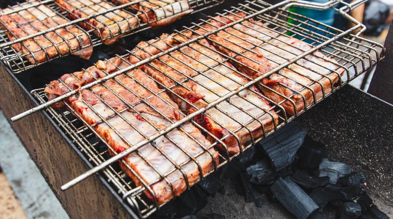 The Meat is Fried on the Grill Over the Coals of the Grill Stock Photo ...