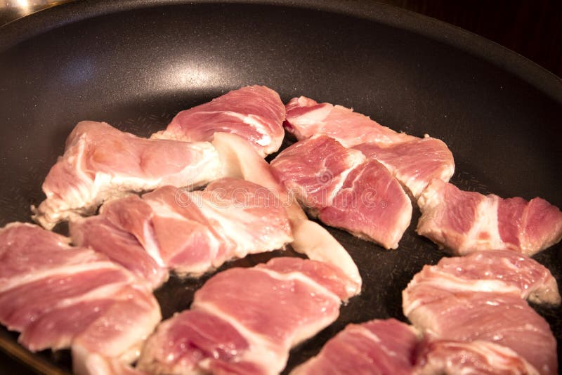 The Meat is Fried in a Pan at Home Stock Photo - Image of pepper ...