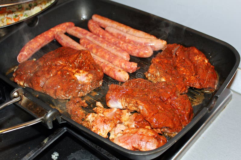 Meat on the grill pan stock photo. Image of meat, burn - 55140830