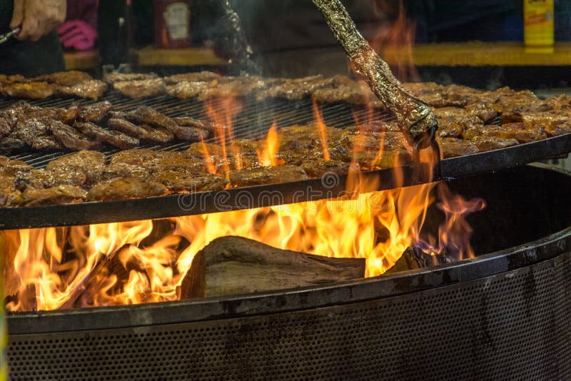 Meat is Grilled on a Giant Grill Stock Photo - Image of fire, cooking ...
