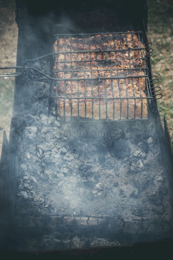 The Meat is Fried in a Grid on the Grill Stock Image - Image of food ...