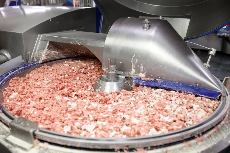 Cutting Meat in Slaughterhouse. the Meat and Sausage Factory. Stock ...