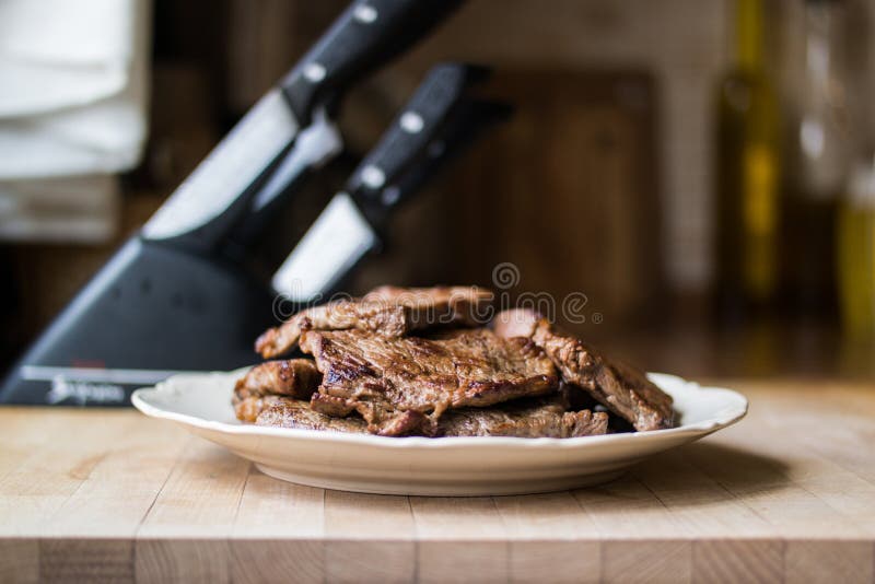 Meat with knife set stock photo. Image of cooking, kitchen - 75304554