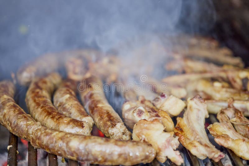 Meat mix on the grill stock image. Image of season, assortment - 317261997
