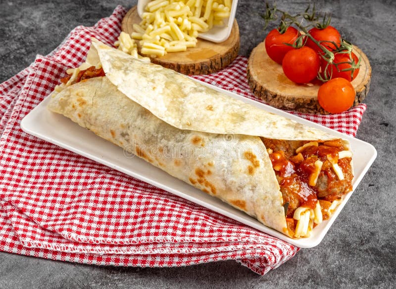 Meat Overload Shawarma Wrap Served in a Cutting Board on Grey ...