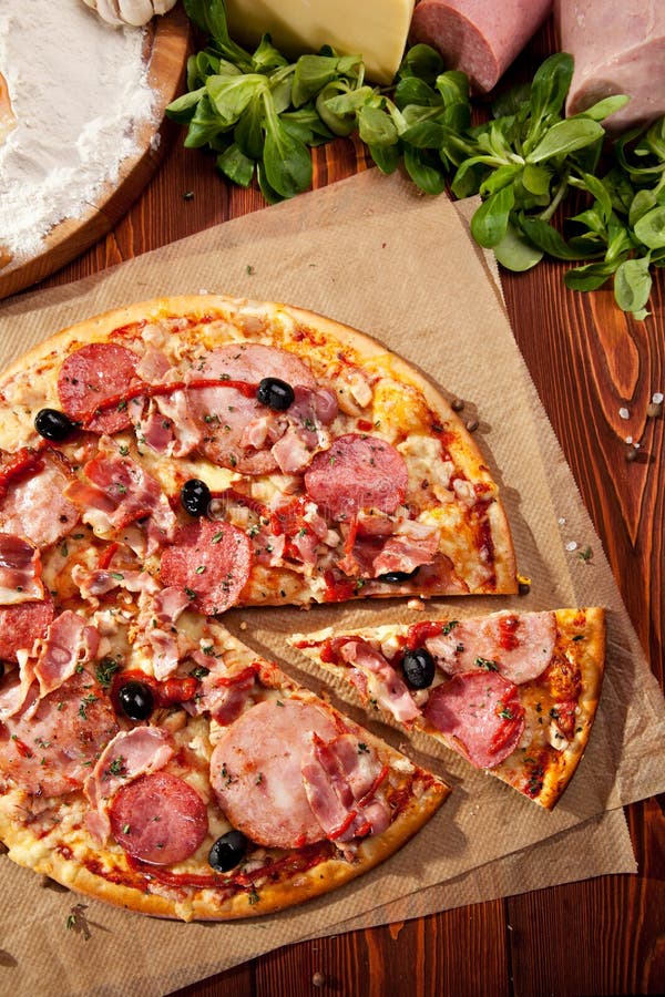 Meat Pizza stock image. Image of paper, pepperoni, olives - 40869437