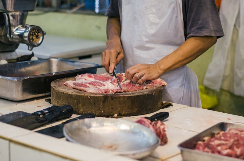Meat Preparation before Processing by Unidentified Butcher Stock Image ...