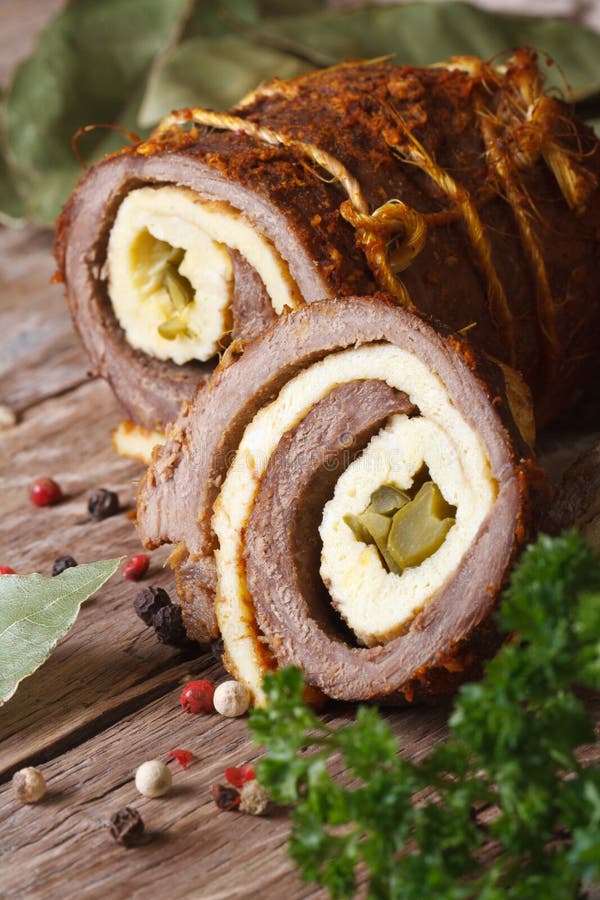 Meat Roll Stuffed with Eggs and Cucumber Closeup. Vertical Stock Photo ...