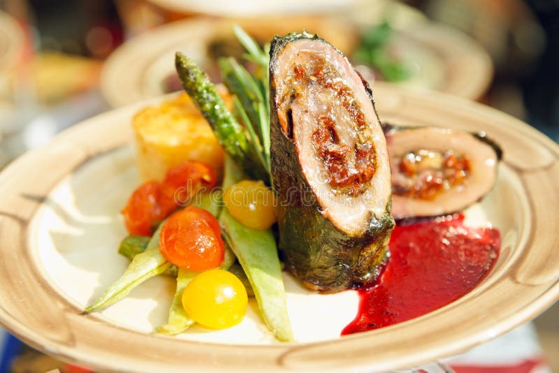 Meat roll with vegetables stock image. Image of tomato - 25128275