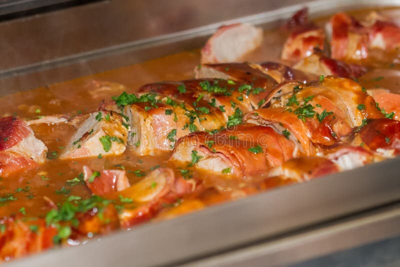 Meat in sauce at a buffet stock image. Image of catering - 267614453