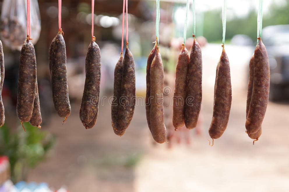 Meat Sausages Hung on a String at the Market. Sausages Hanging on ...