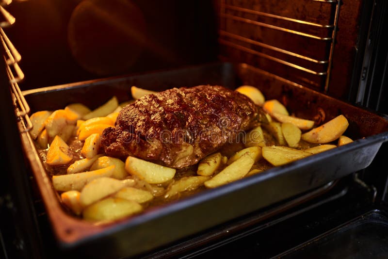 Meat in Seasoning Ready for Baking in the Oven. Cooking Homemade Meat ...