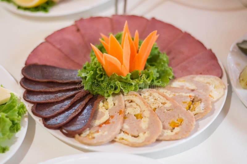 Meat sliced on a plate stock photo. Image of plate, salami - 124095224