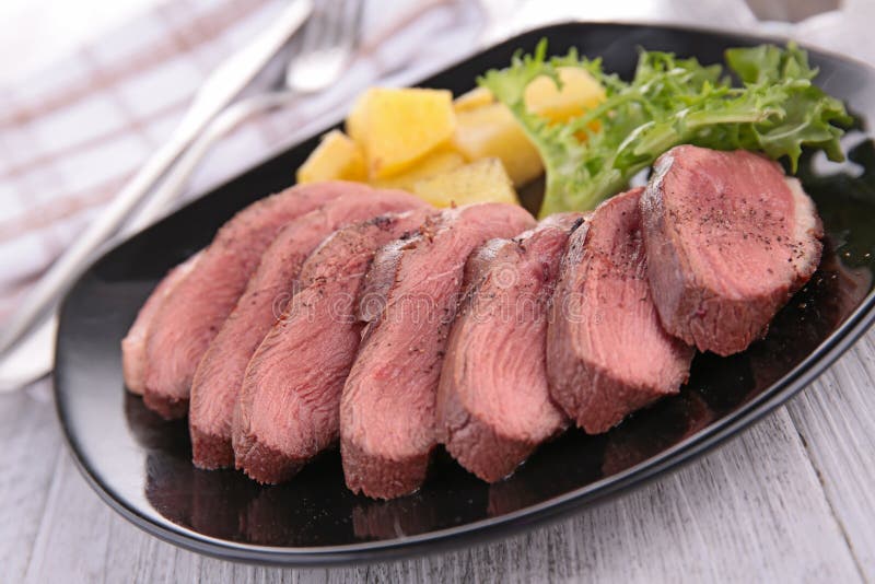 Meat sliced and vegetables stock image. Image of dining - 40889497