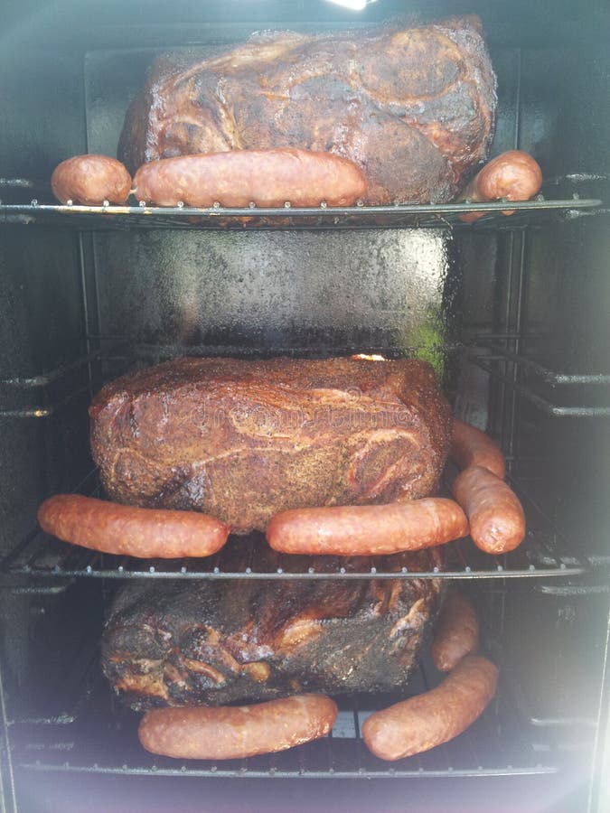 Meat in a smoker stock photo. Image of grill, smoke, chop - 69904554