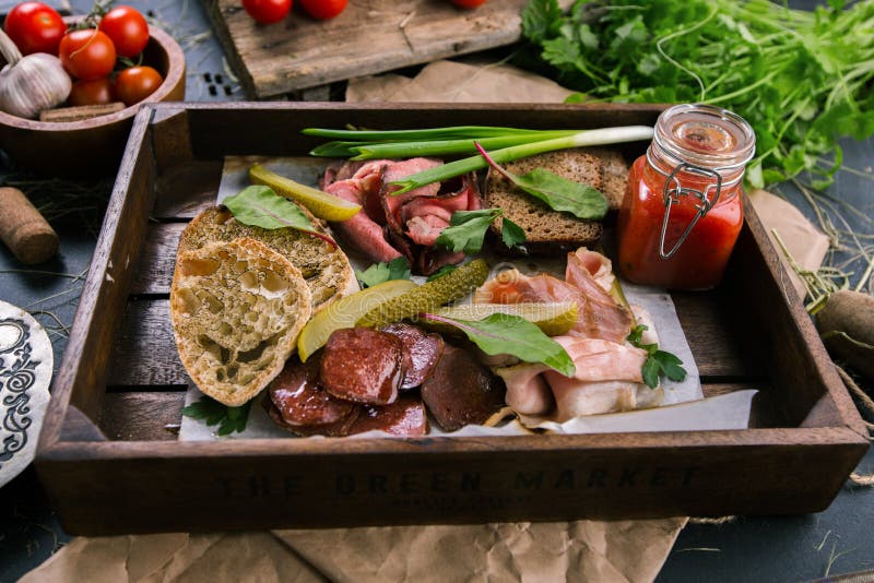 Meat Snacks with Toast and Vegetables in a Restaurant Stock Photo ...