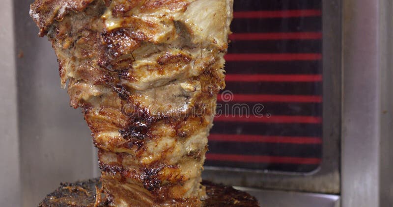 Meat on a Spit . Cooking Doner Kebab or Shawarma on a Rotating Vertical ...