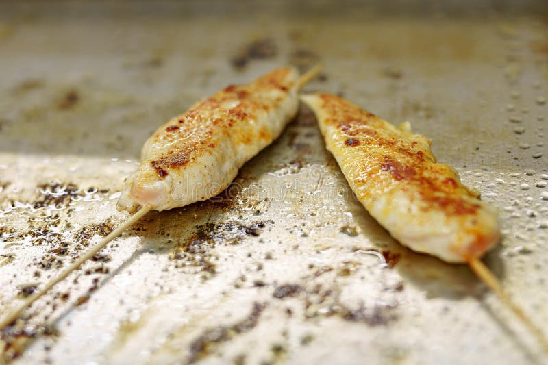 Meat on a Stick is Fried on a Stove in a Restaurant Kitchen Stock Photo ...