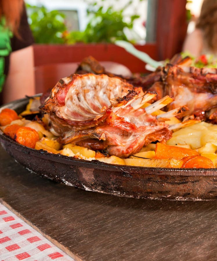 Meat under a bell stock photo. Image of vegetables, plate - 20111906