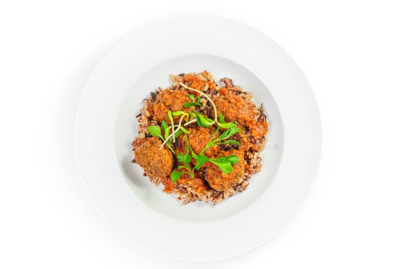 Meatballs with Brown Rice in the White Plate Isolated on White Stock ...