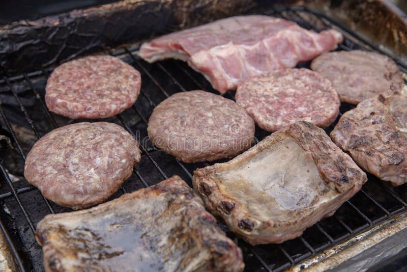Meats being cooked stock photo. Image of american, griller - 122033610