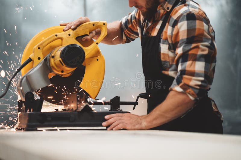 Mechanic Angular Grinding Machine in Action, Sparks Fly Apart. Work in ...