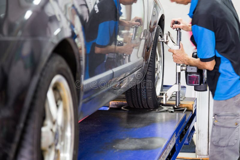 Car Wheel Alignment Service Work Stock Image - Image of mechanic ...