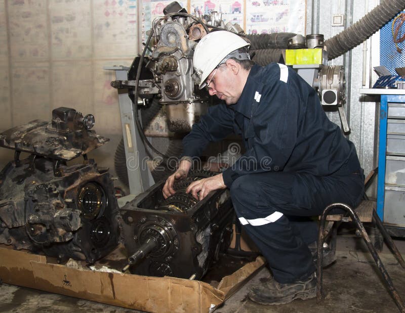 Mechanic Behind Work in Garage Stock Image - Image of hands, safety ...