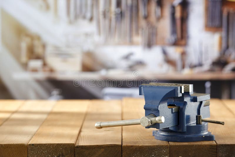 Mechanic Bench Vice Clamp on a Wooden Workbench in Craftsman S Workshop ...