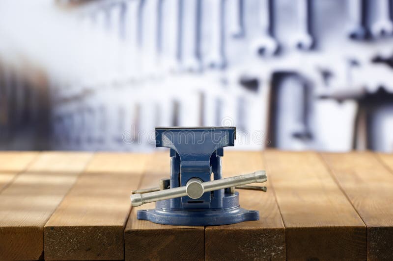 Mechanic Bench Vice Clamp on a Wooden Workbench in Craftsman S Workshop ...