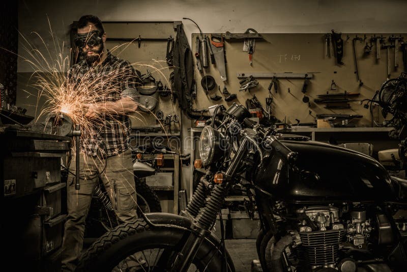 Mechanic at Motorcycle Customs Garage Stock Photo - Image of mechanic ...